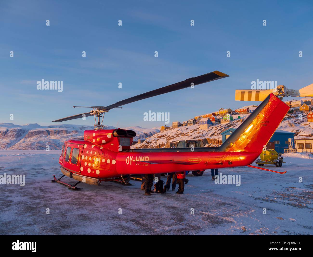 Air Greenland Bell 212 on the helipad of Uummannaq. Uummannaq during ...