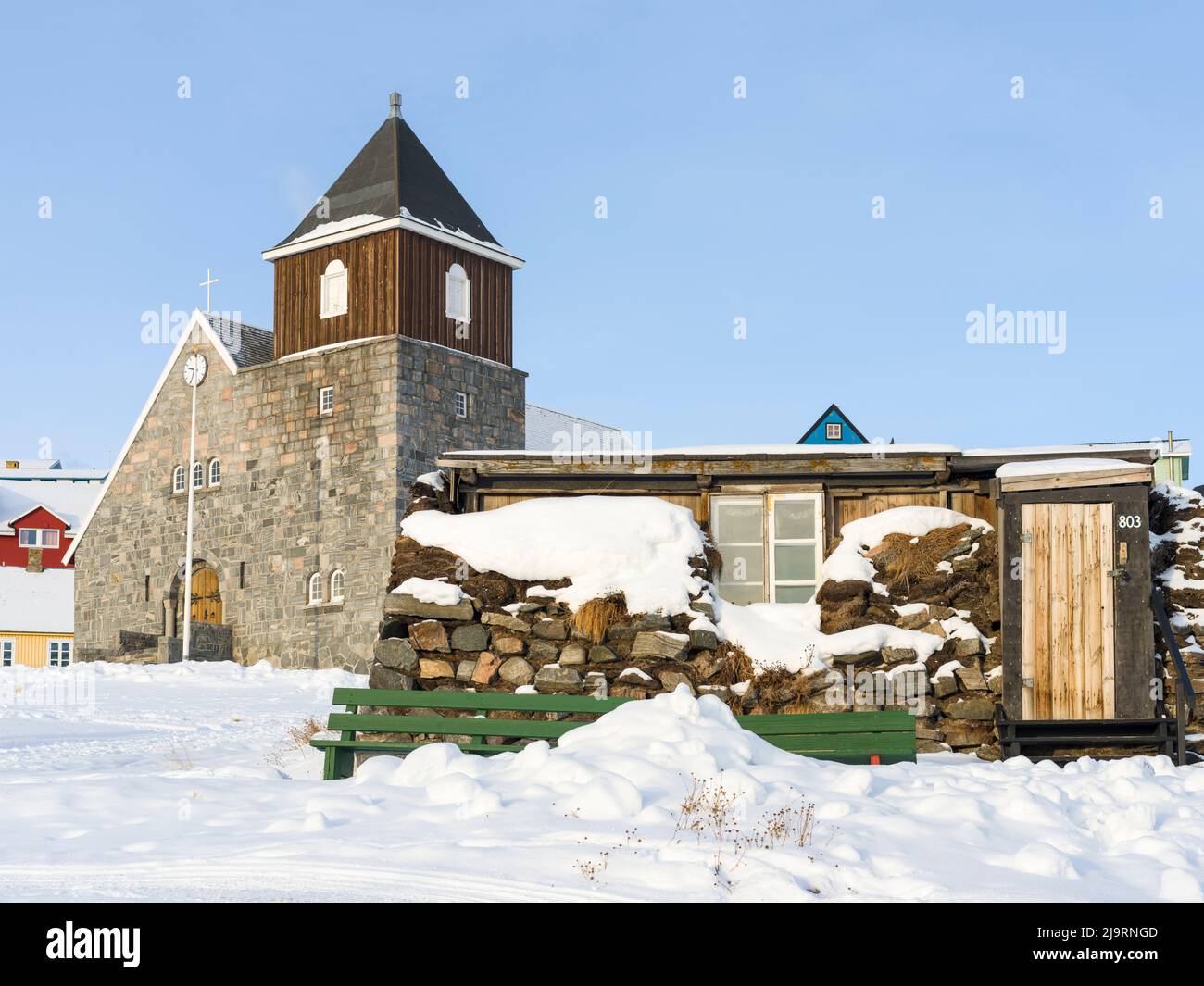 The church. Town Uummannaq during winter in northern West Greenland ...