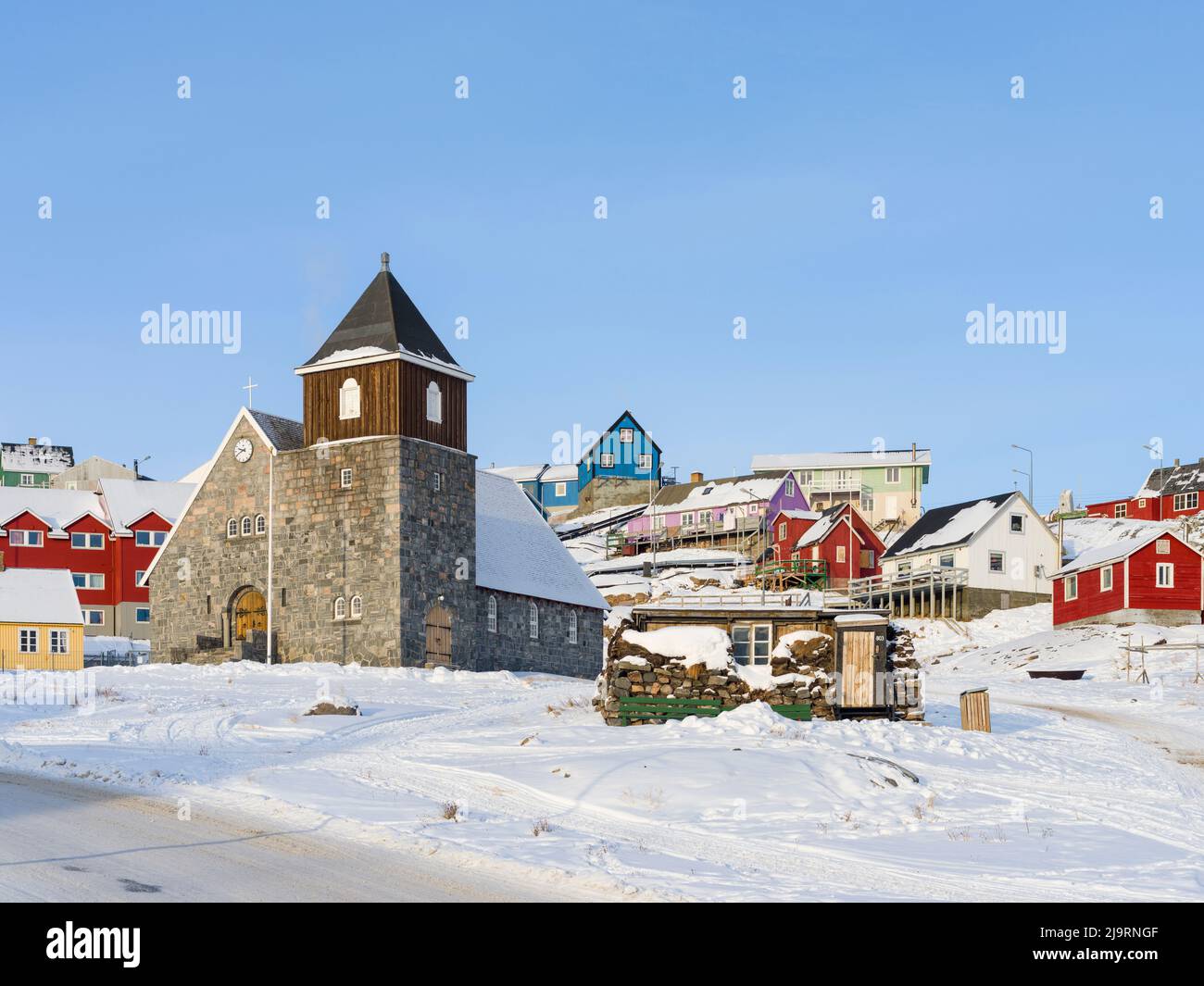 The church. Town Uummannaq during winter in northern West Greenland ...