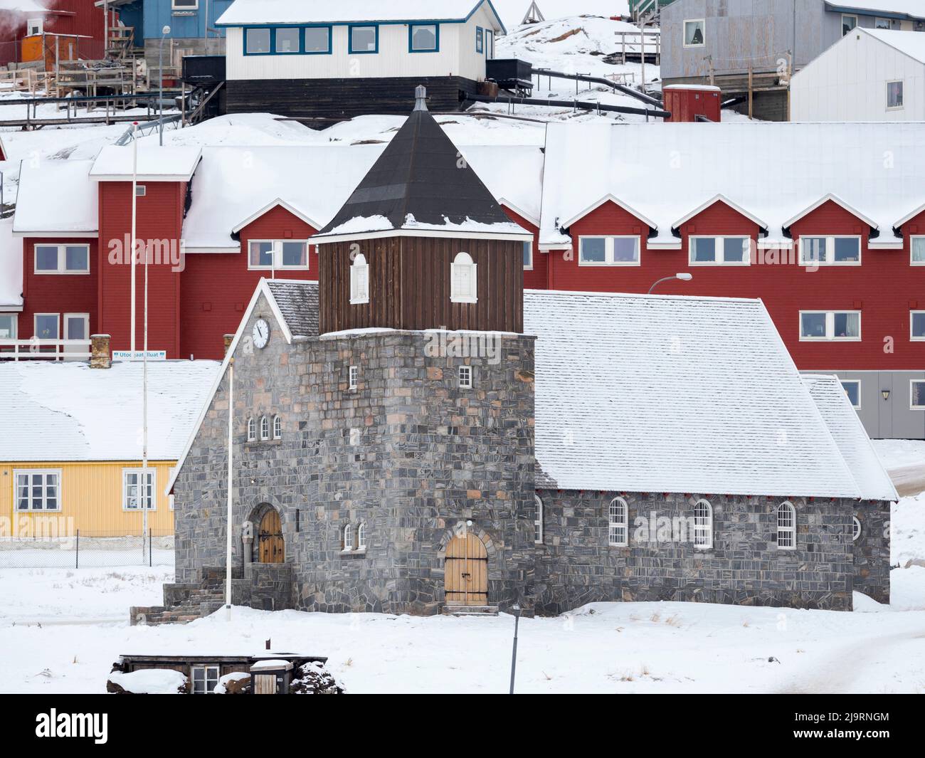 The church. Town Uummannaq during winter in northern West Greenland ...