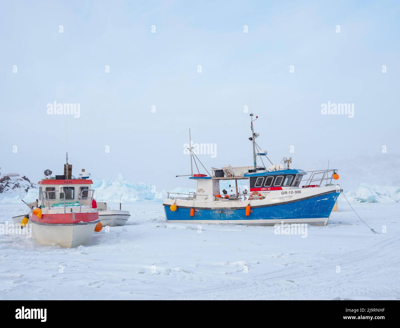 The harbor of Ikerasak near Uummannaq during winter in northern West ...