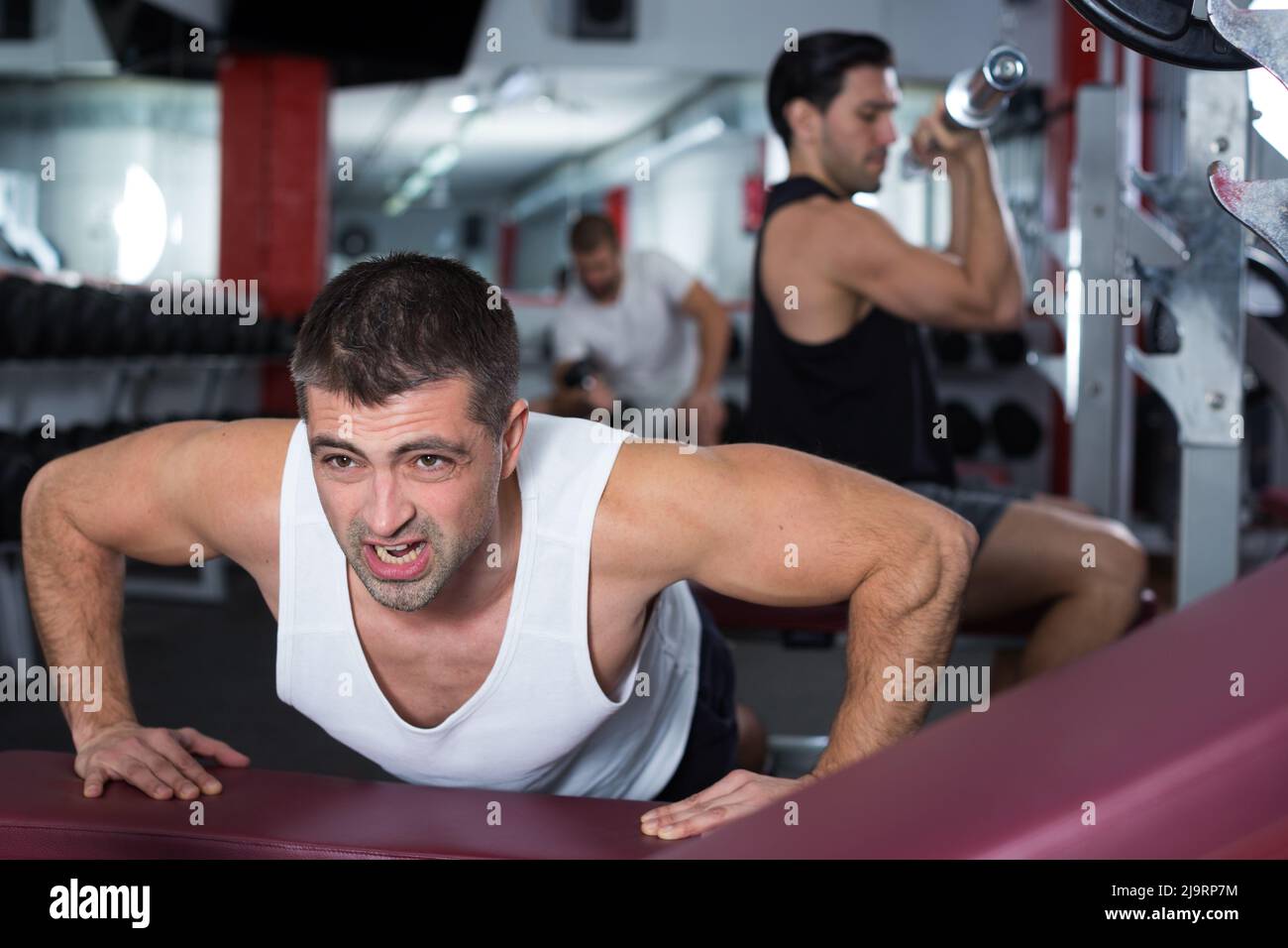 Man performing push-ups during training Stock Photo - Alamy