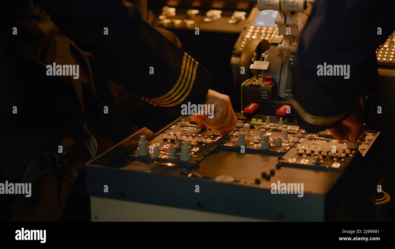 Plane aircrew preparing for aviation flight with dashboard command ...