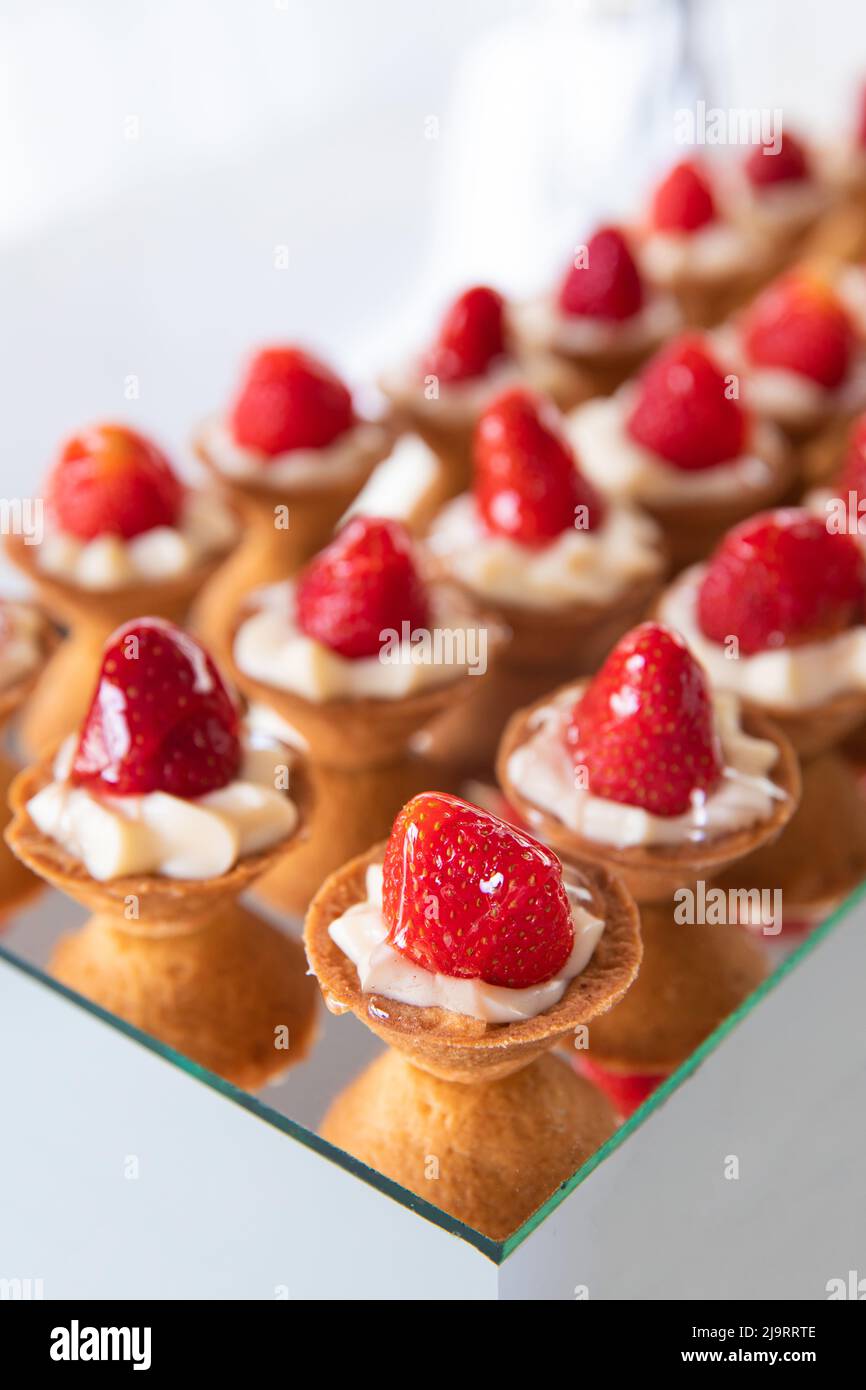 Mini Strawberry Fruit appetizing Tarts. Pastry cupcake dessert with ...