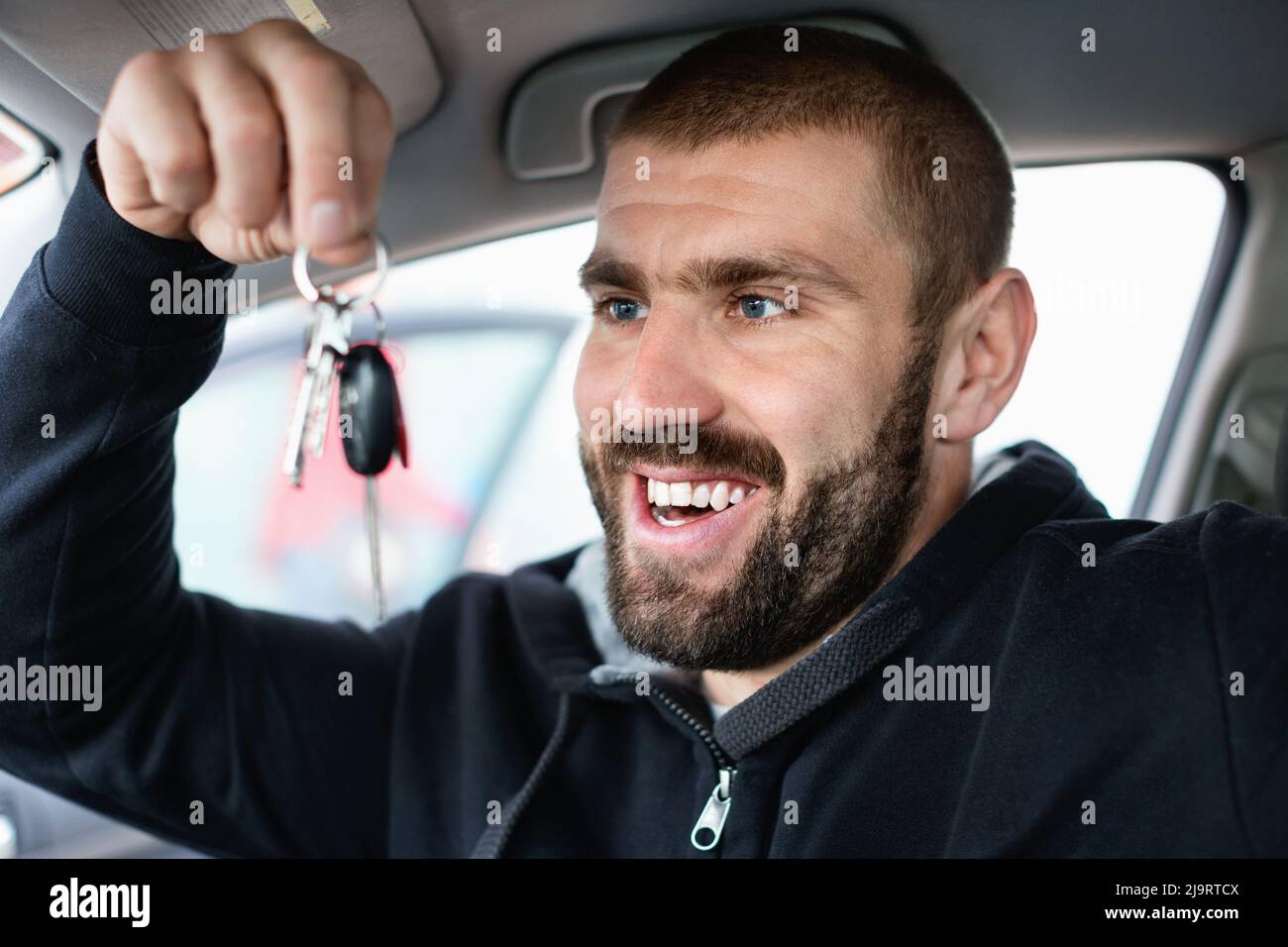 Man holding car keys model hi-res stock photography and images - Alamy