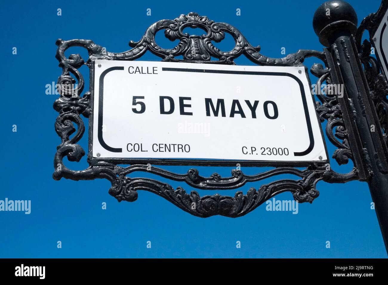 La Paz, Mexico. Ornate ironwork street sign Stock Photo - Alamy
