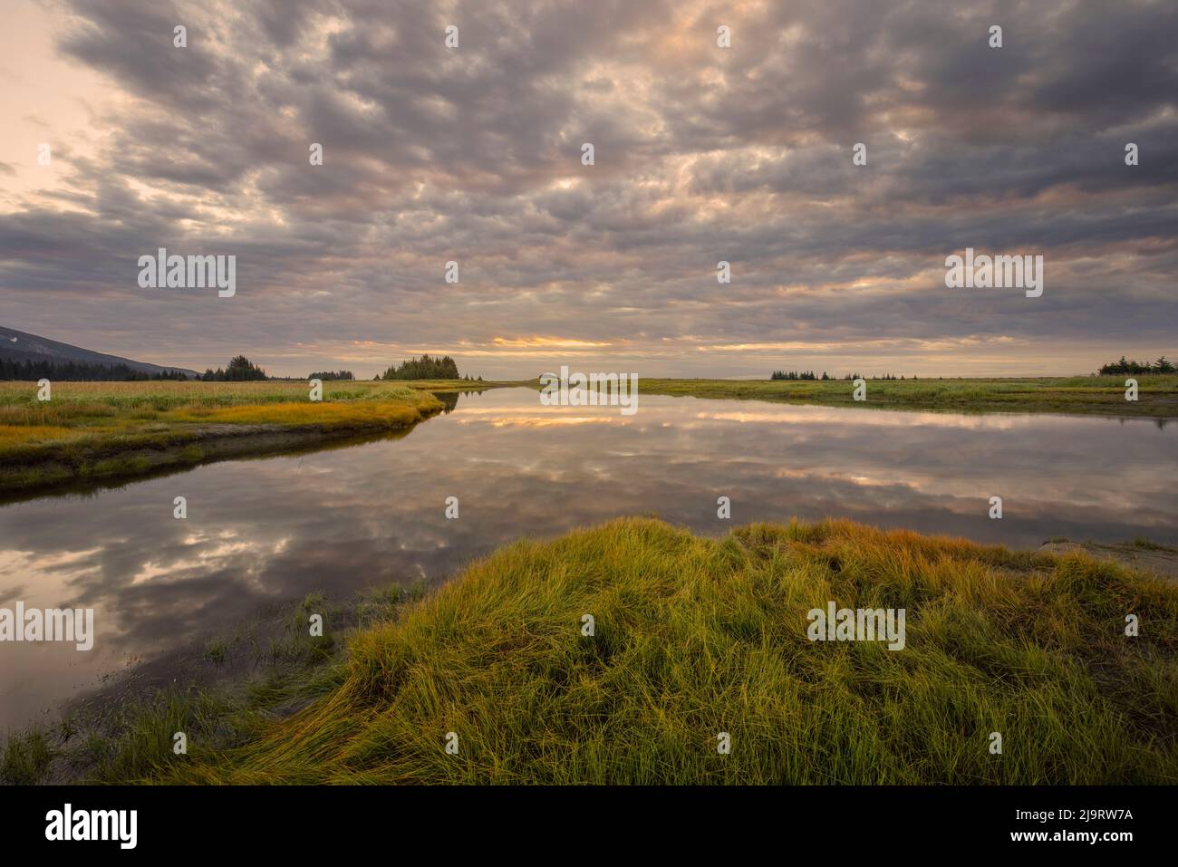 Sunrise on slough of Silver Salmon Creek, Lake Clark National Park and ...