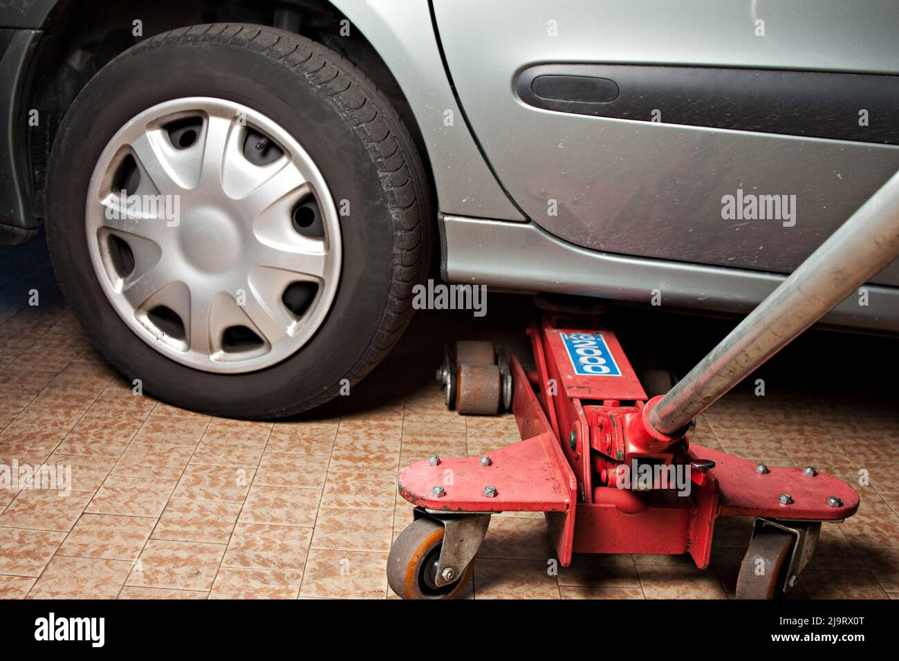 Car lifted jack hi-res stock photography and images - Alamy