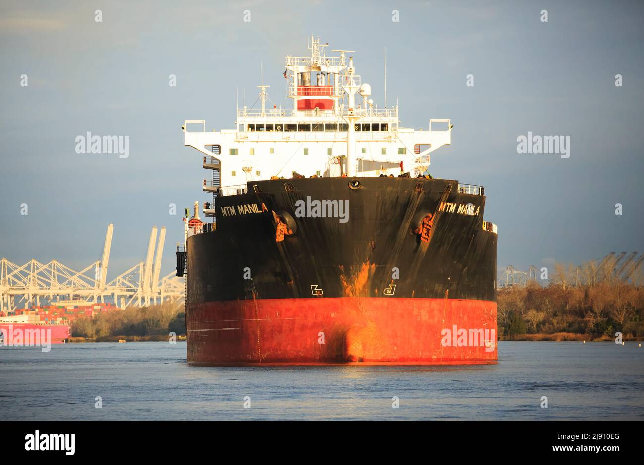 USA, Georgia, Savannah. Container ship departing Savannah Harbor Stock ...