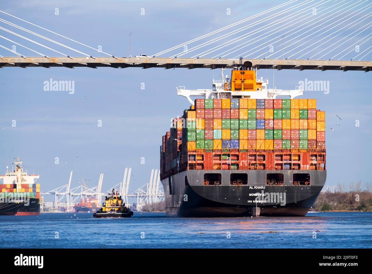 USA, Georgia, Savannah. Container ship entering Savannah Harbor ...