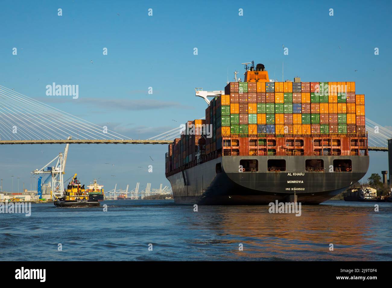 USA, Georgia, Savannah. Container ship entering Savannah Harbor ...