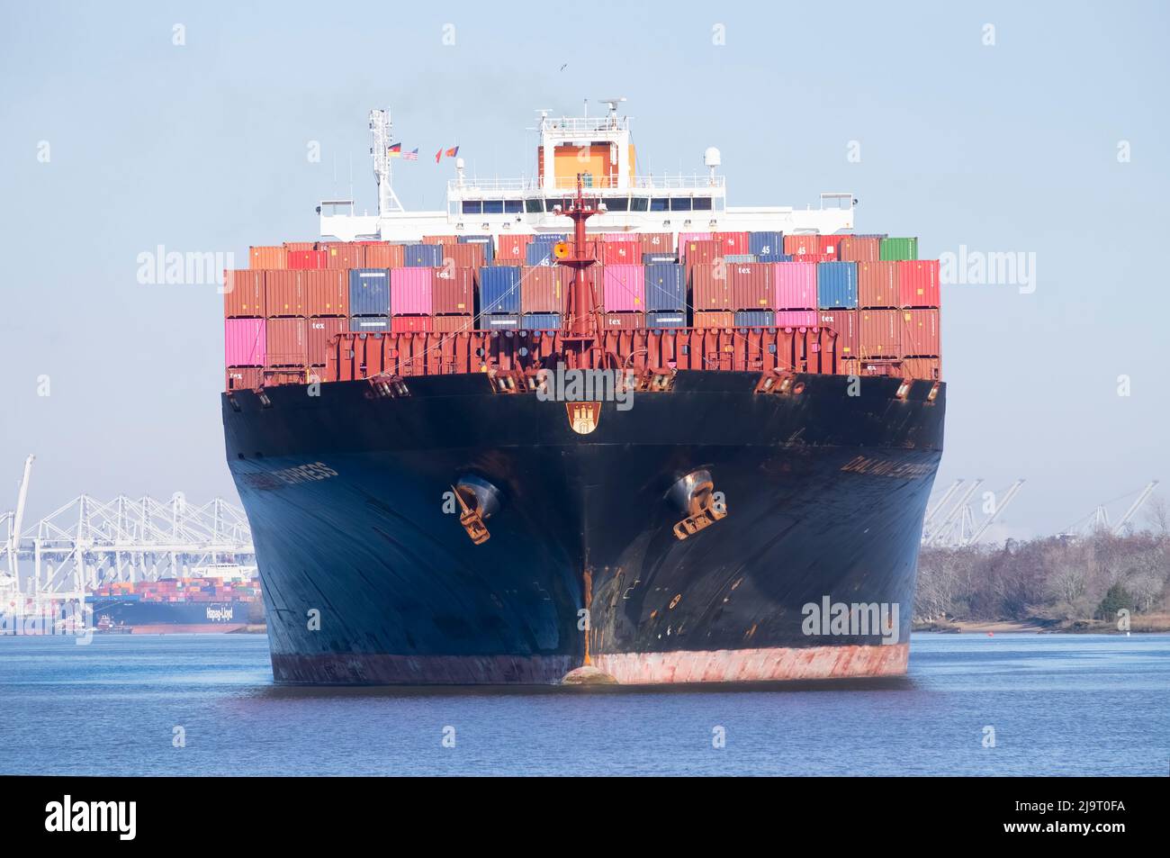 USA, Georgia, Savannah. Container ship departing Savannah Harbor ...