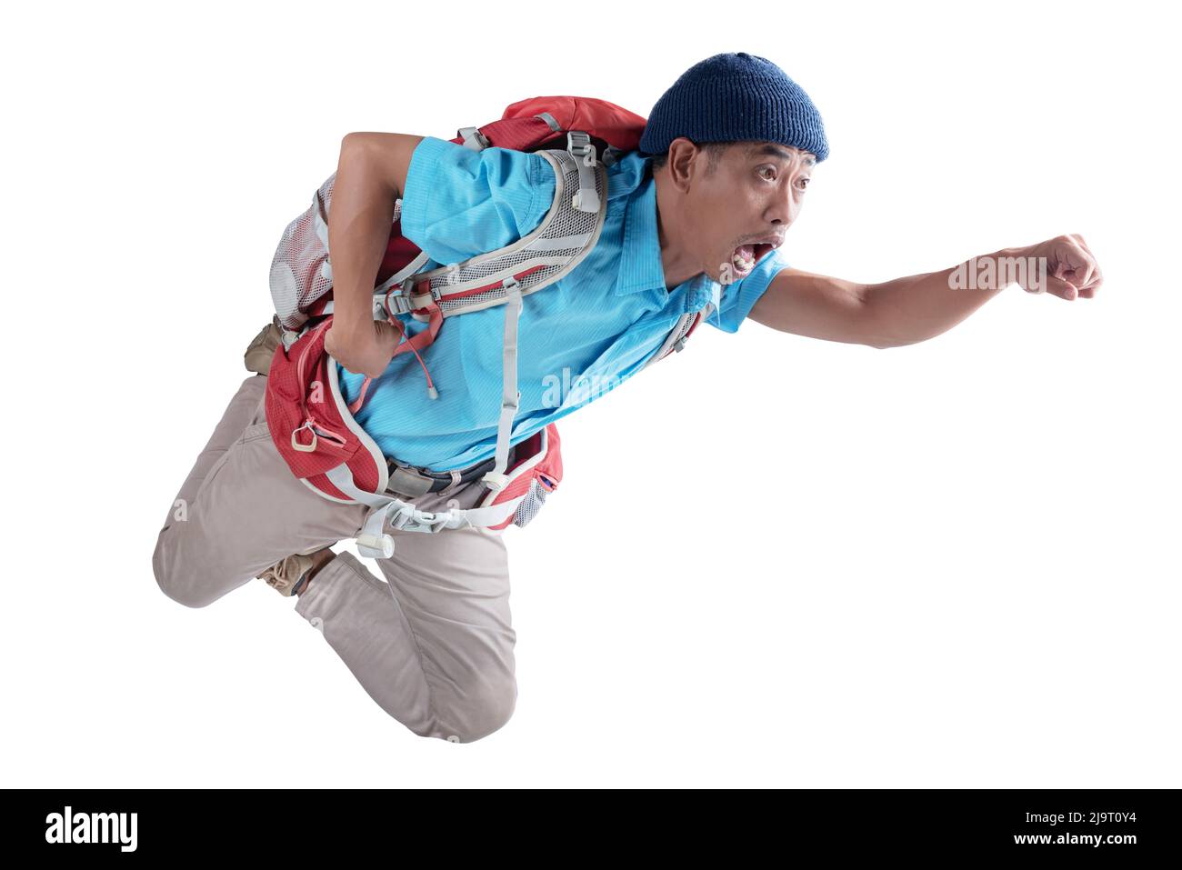 Asian man with a beanie hat and backpack flying isolated over white ...