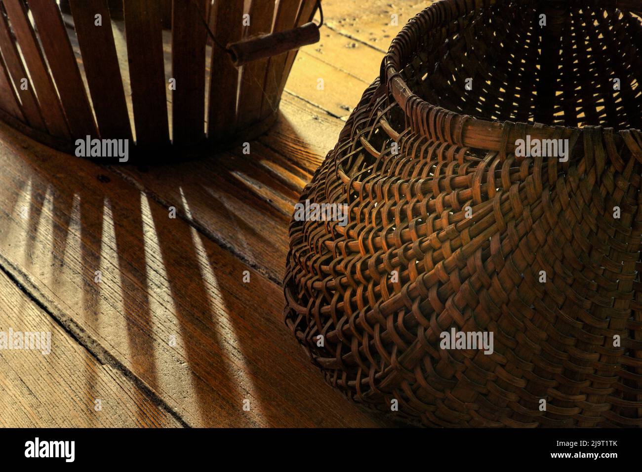 Afternoon light illuminating hand-woven basket, Shaker Village of ...