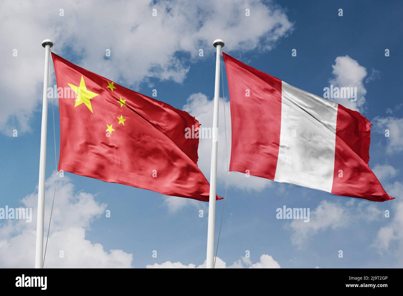 China and Peru two flags on flagpoles and blue cloudy sky background ...