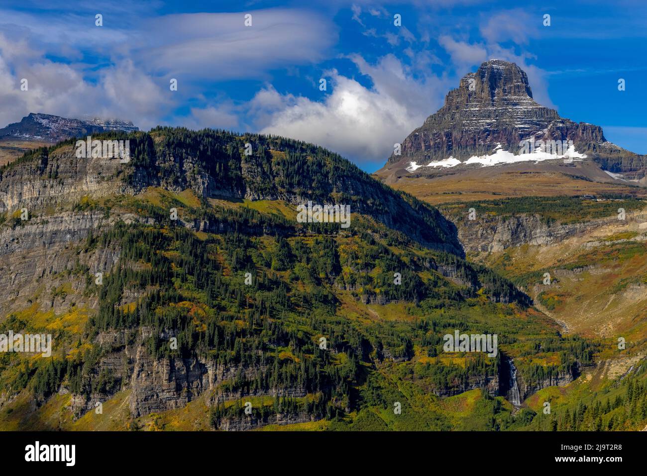 Clements Mountain and Reynolds Creek Falls in autumn, Glacier National ...