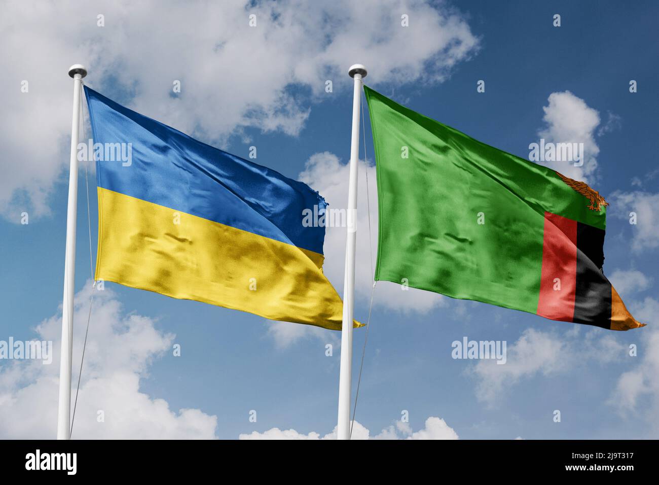 Ukraine and Zambia two flags on flagpoles and blue cloudy sky background Stock Photo - Alamy