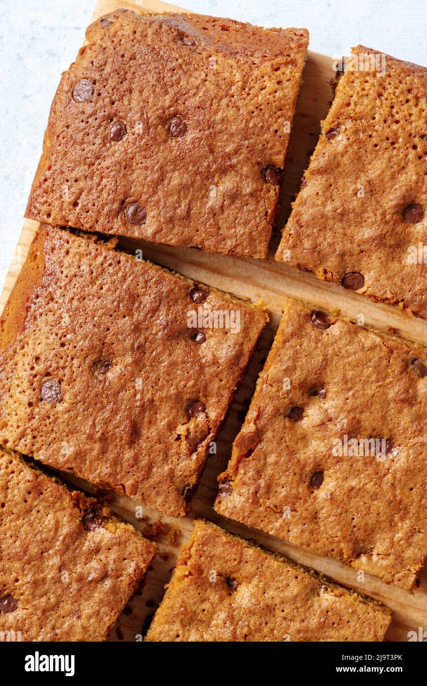 Blondie brownie dessert bars with chocolate chips, shot from above ...