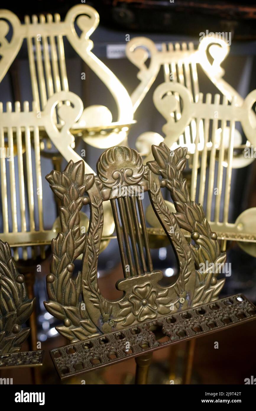 Collection of brass music stands Stock Photo - Alamy