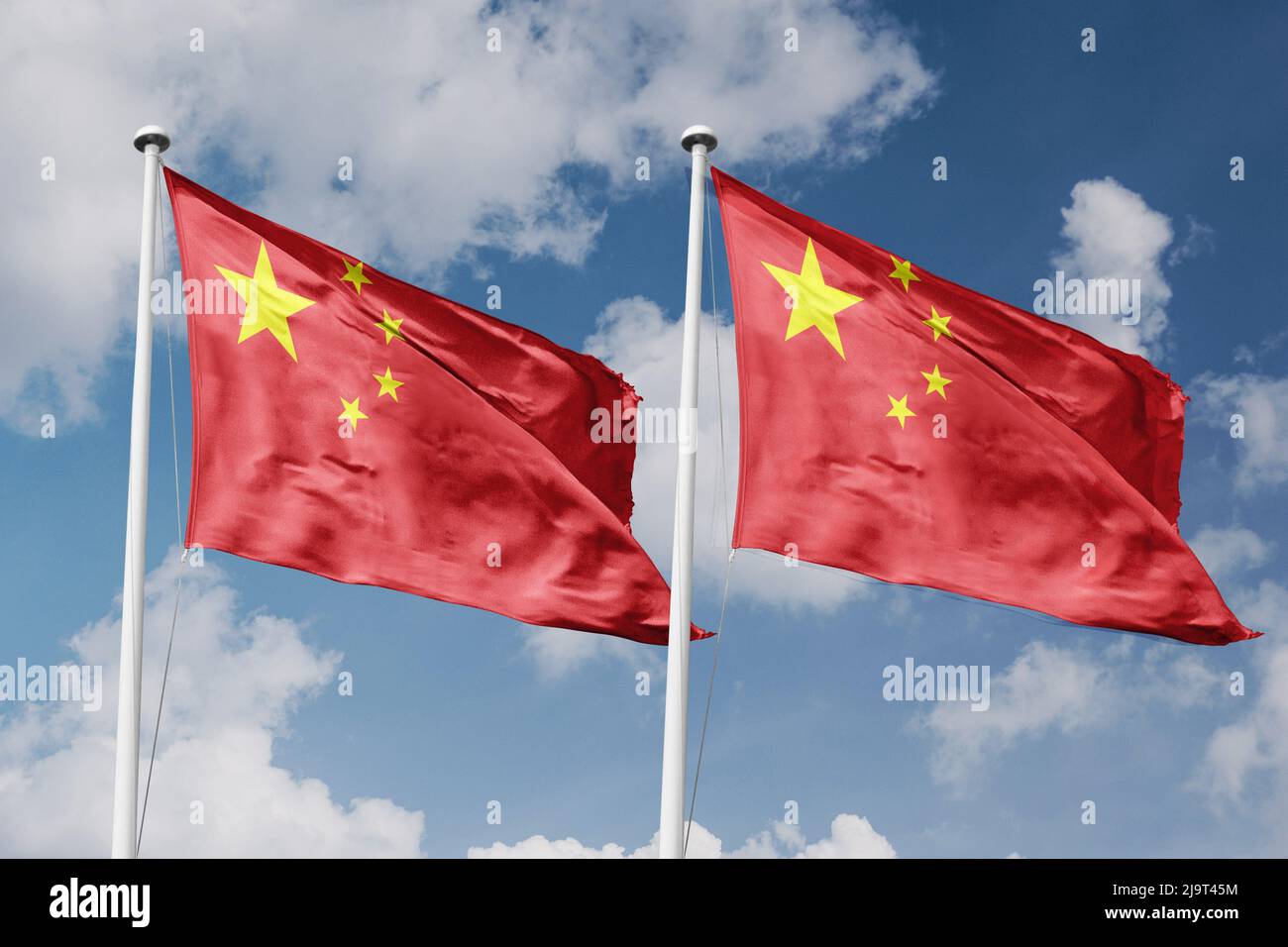 China and China two flags on flagpoles and blue cloudy sky background ...