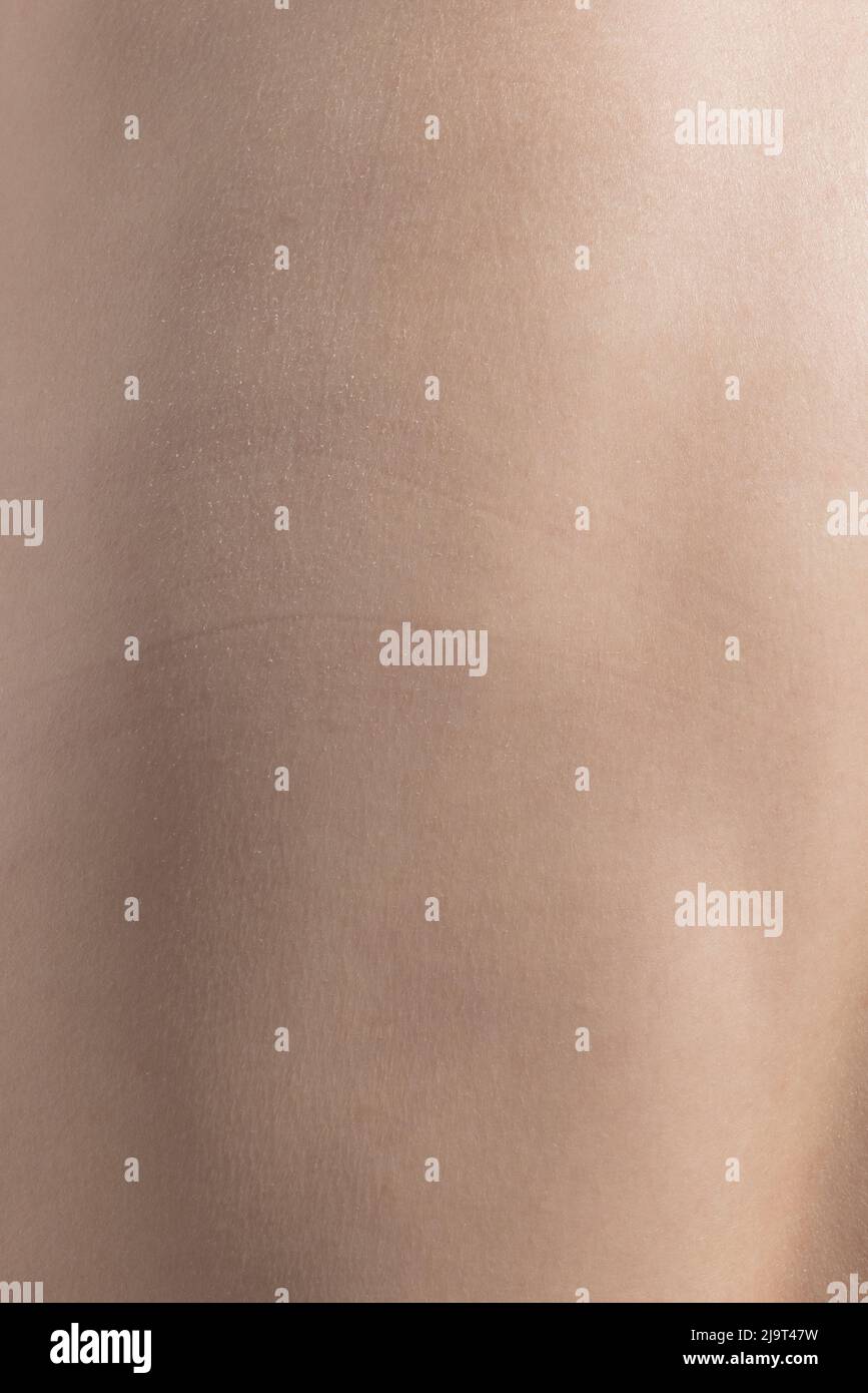 Detailed texture of human female skin. Close up part of woman's body ...
