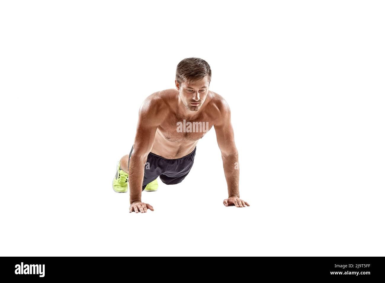 Push up fitness man doing push-up bodyweight exercise on gym floor ...