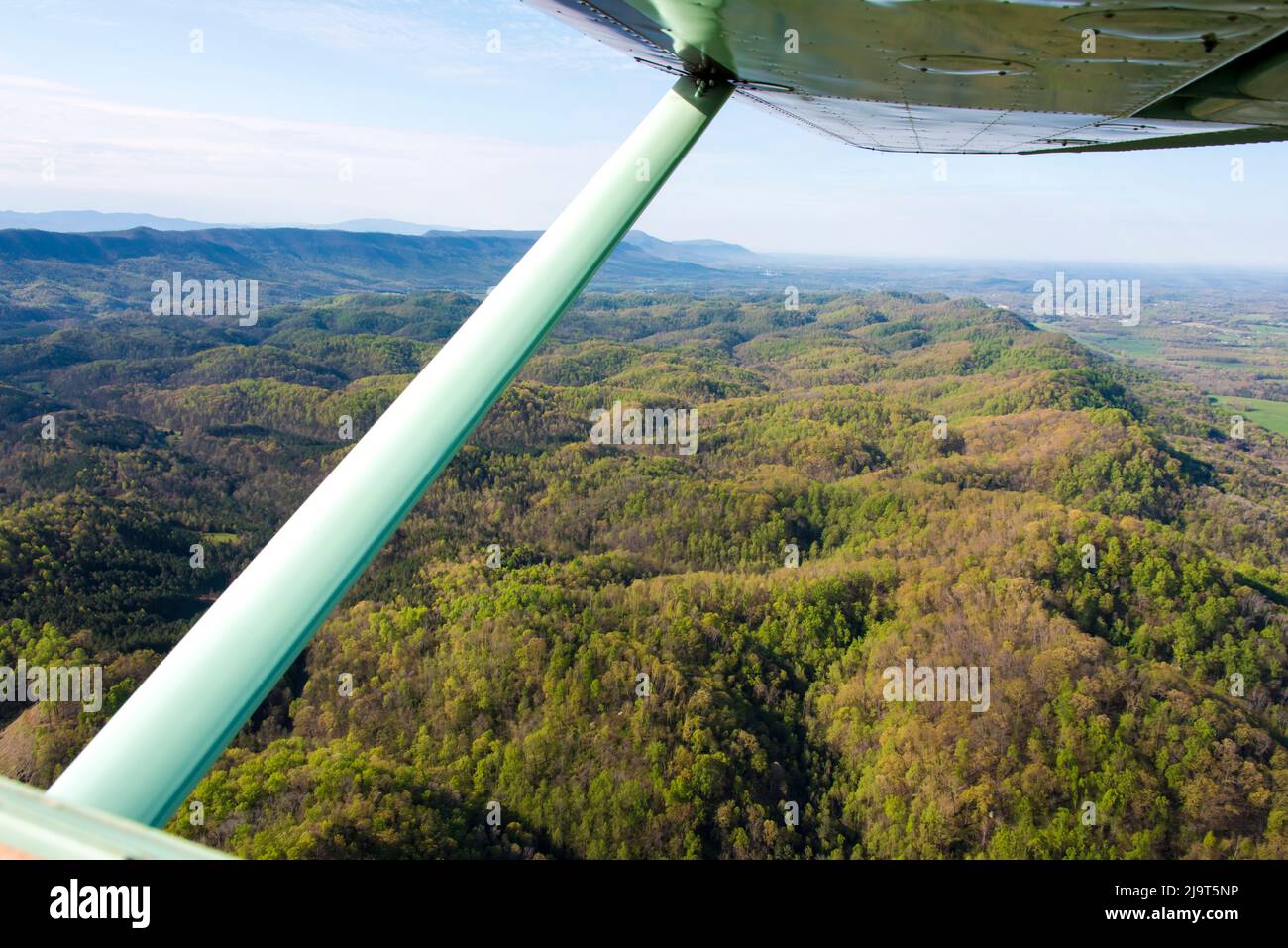 USA, Tennessee. Airplane wing and strut frame view Appalachian Mts and ...