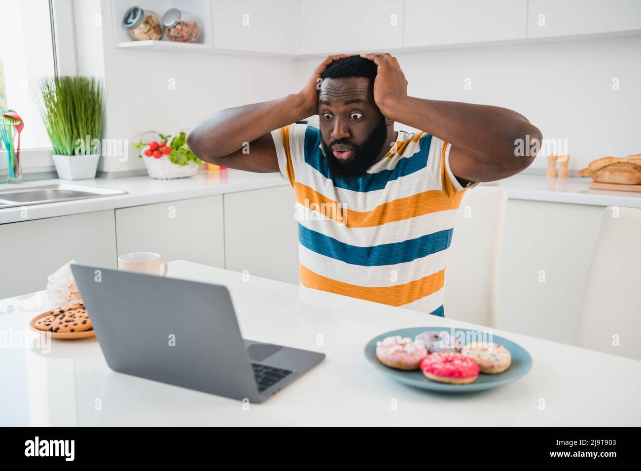 Photo of young astonished man hands touch head fail problem project ...