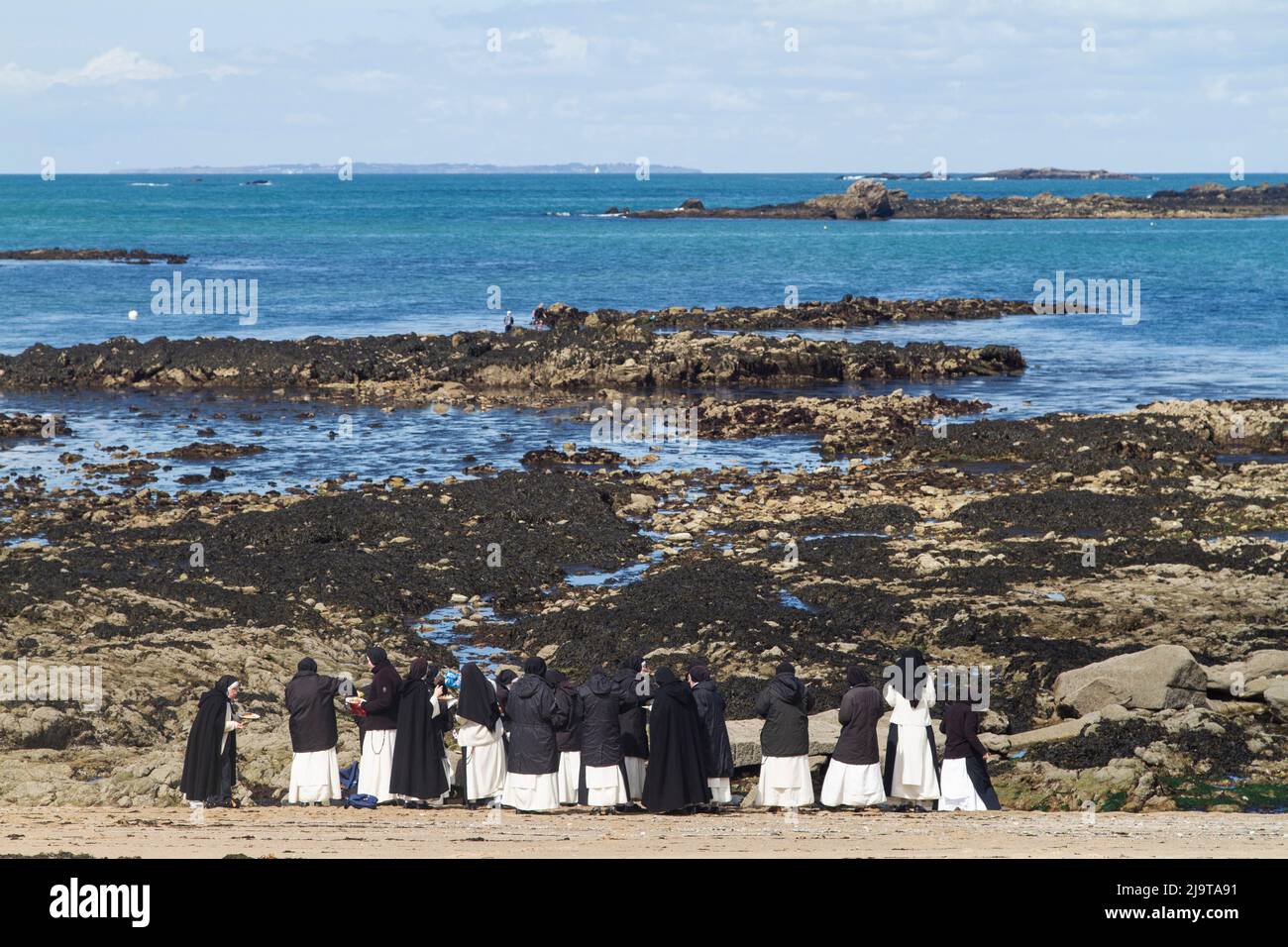 a group of religious sisters at a beach Stock Photo - Alamy