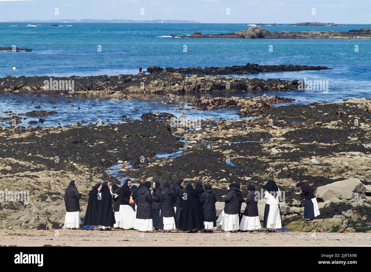 a group of religious sisters at a beach Stock Photo - Alamy