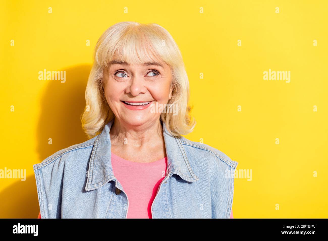 Photo of charming sweet lady pensioner dressed denim waistcoat looking ...