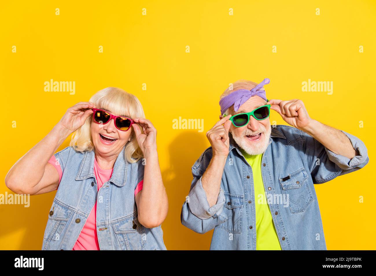 Photo of cool excited husband wife wear jeans shirts hands arms ...