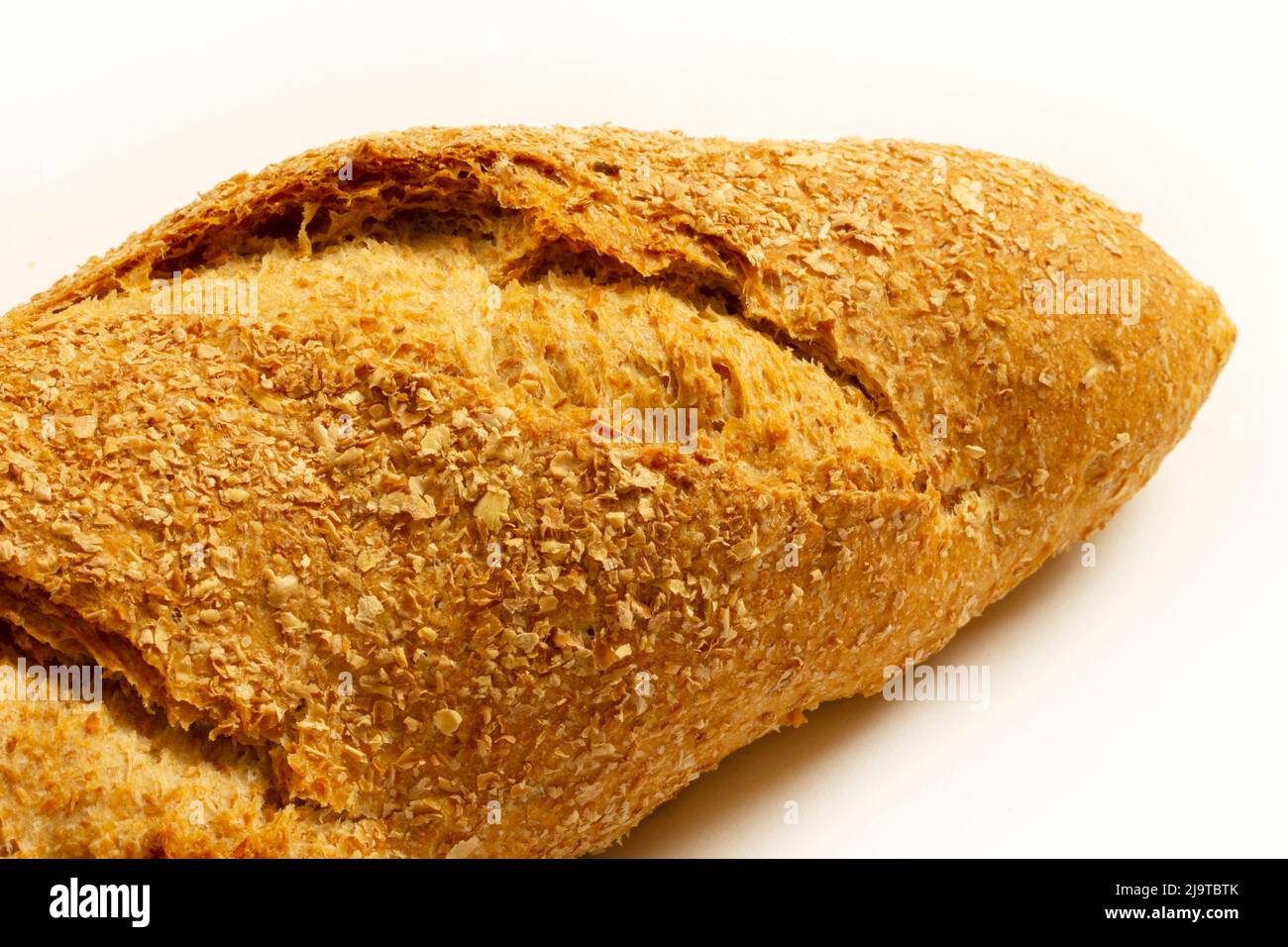 one loaf of bread close-up on a white background Stock Photo - Alamy