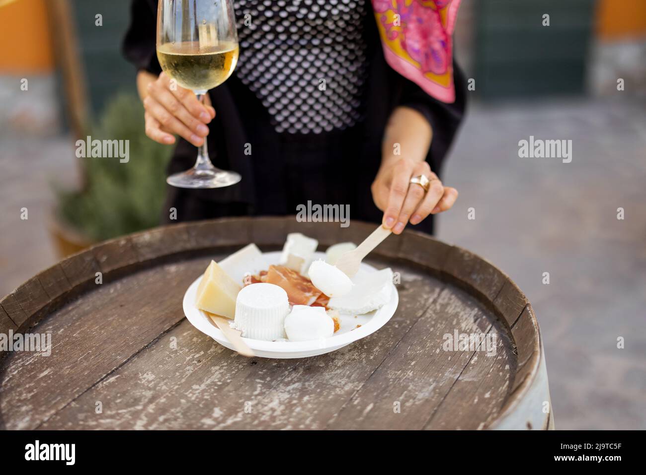 Woman tasting cheese hi-res stock photography and images - Alamy