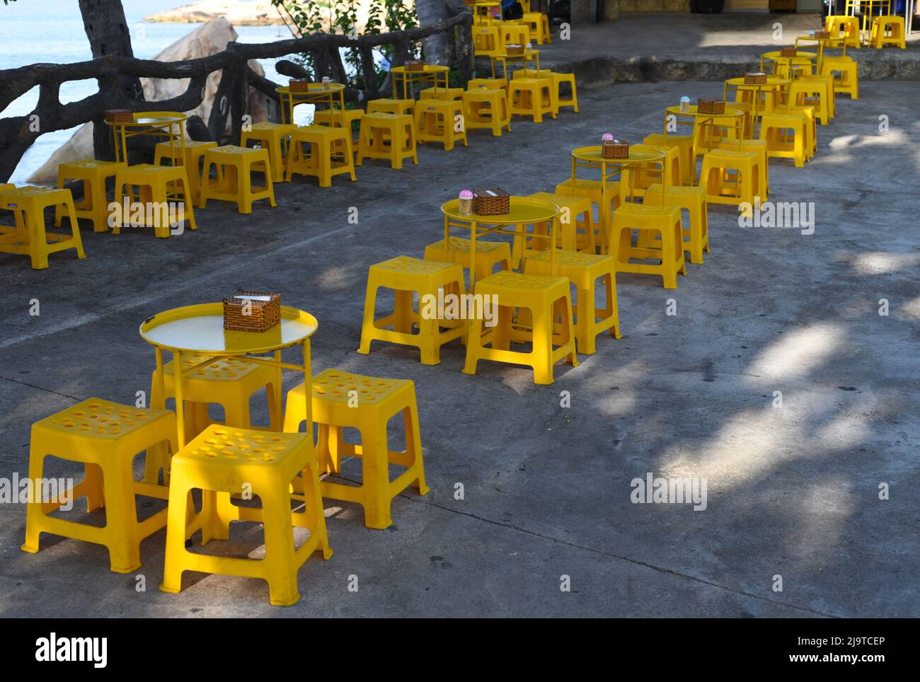 Vietnamese small tables and chairs for street food Stock Photo - Alamy