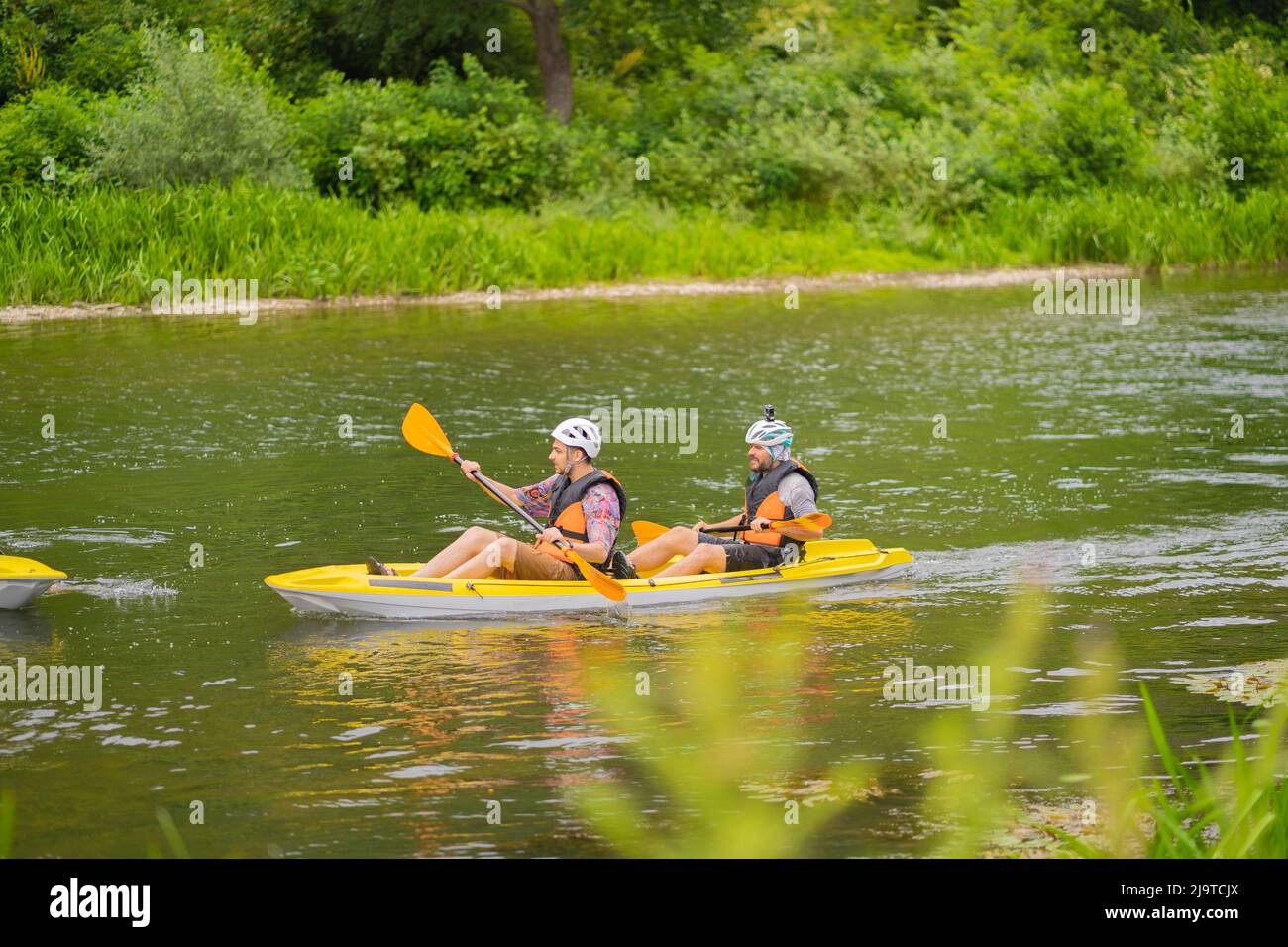 Two young and senior males are trying to keep up with the rest of the ...