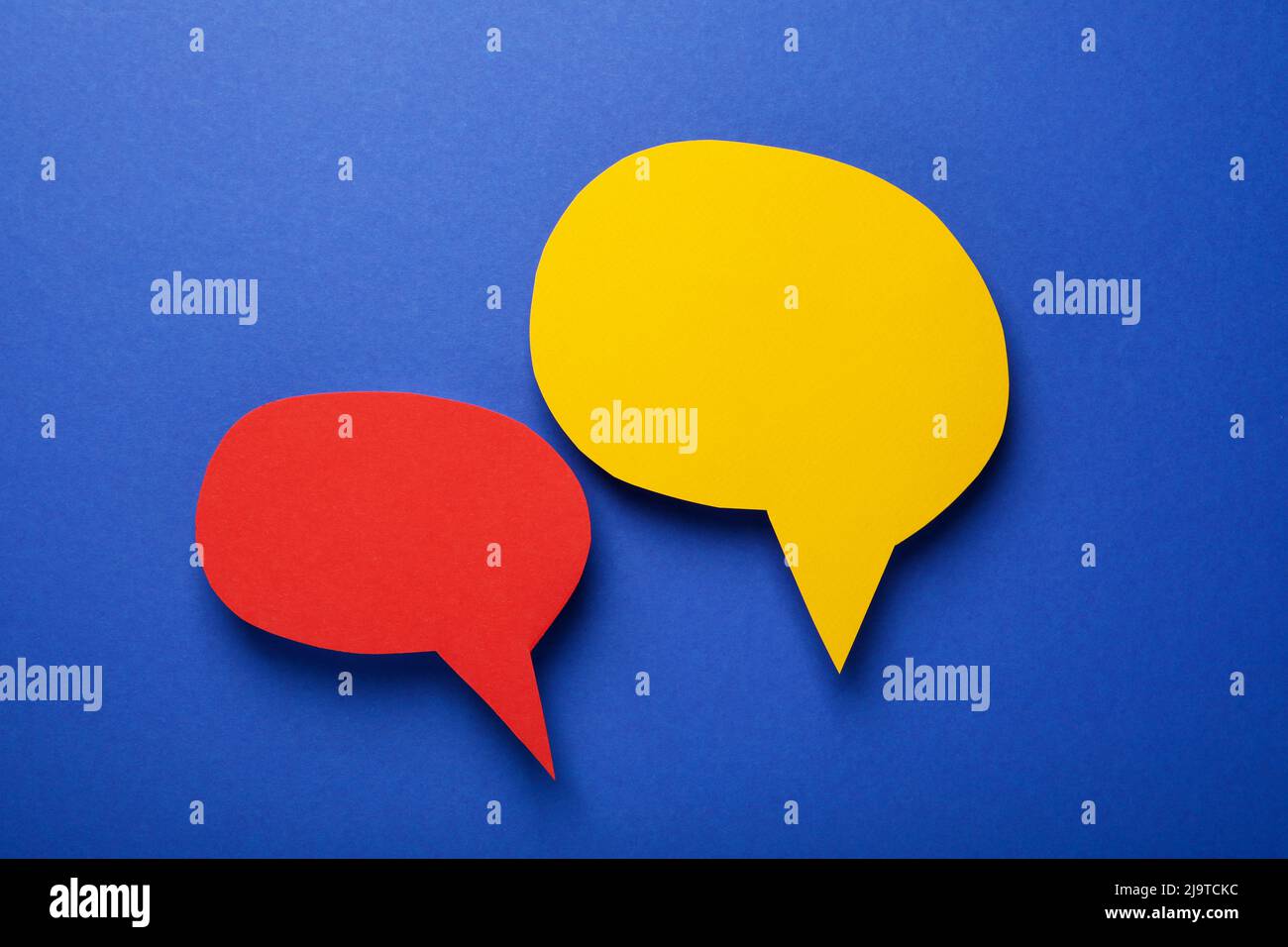 Yellow speech bubbles hi-res stock photography and images - Alamy