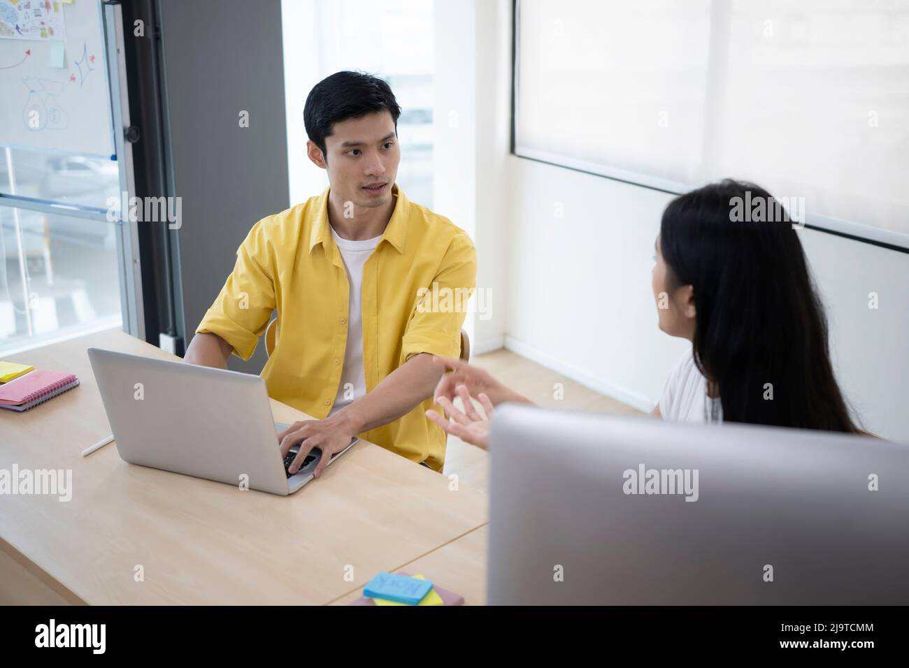 Female business leader explaining new project and discussing corporate ...