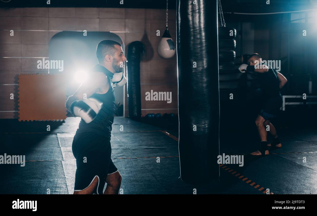 Male boxer training practicing punches hi-res stock photography and ...