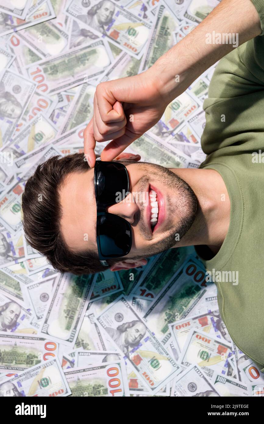 High angle view vertical portrait of nice man hand touch glasses laying ...
