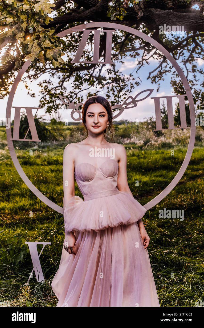 Beautiful woman big clock hi-res stock photography and images - Alamy