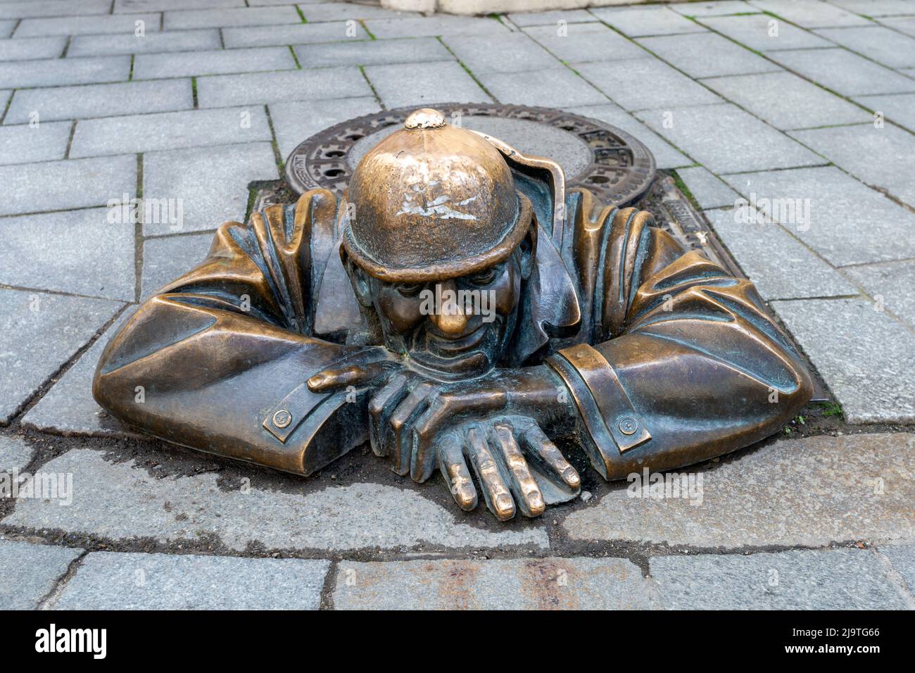 Bratislava, Slovakia - 05 21 2022: Statue of Cumil, the man at work in ...