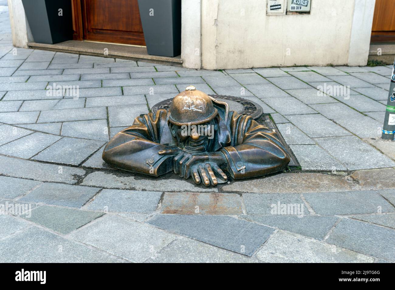 Bratislava, Slovakia - 05 21 2022: Statue of Cumil, the man at work in ...