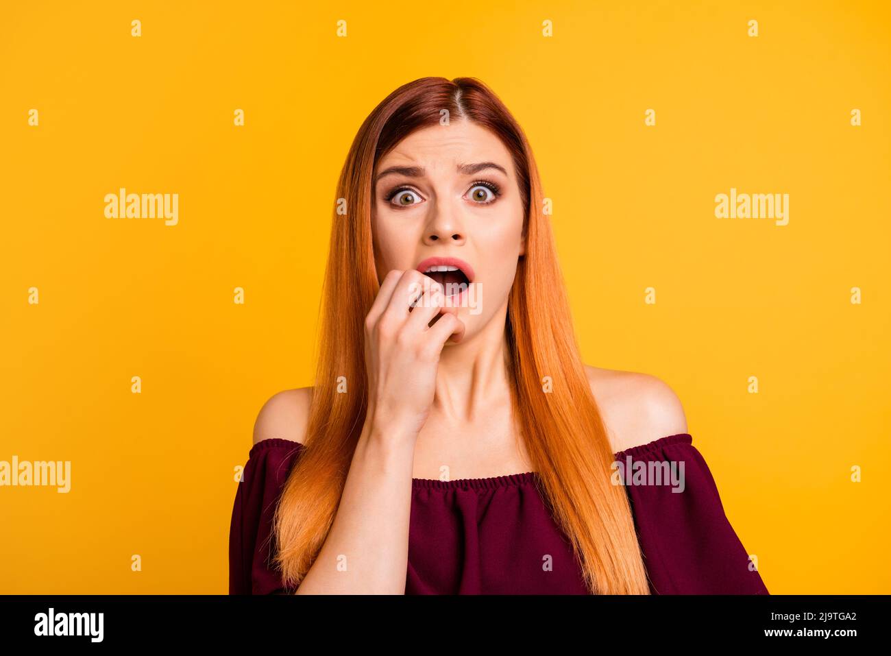 Portrait of scared unsatisfied negative girl hand near mouth stare ...