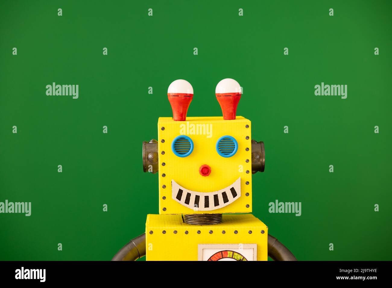 Happy toy robot. Education, creative and innovation technology concept ...