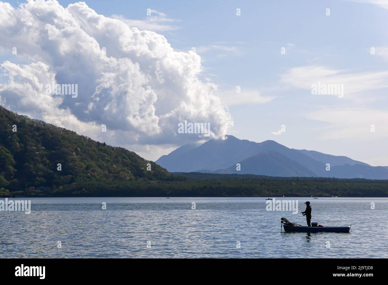 Man boat in sea sunset sky boat hi-res stock photography and images - Alamy