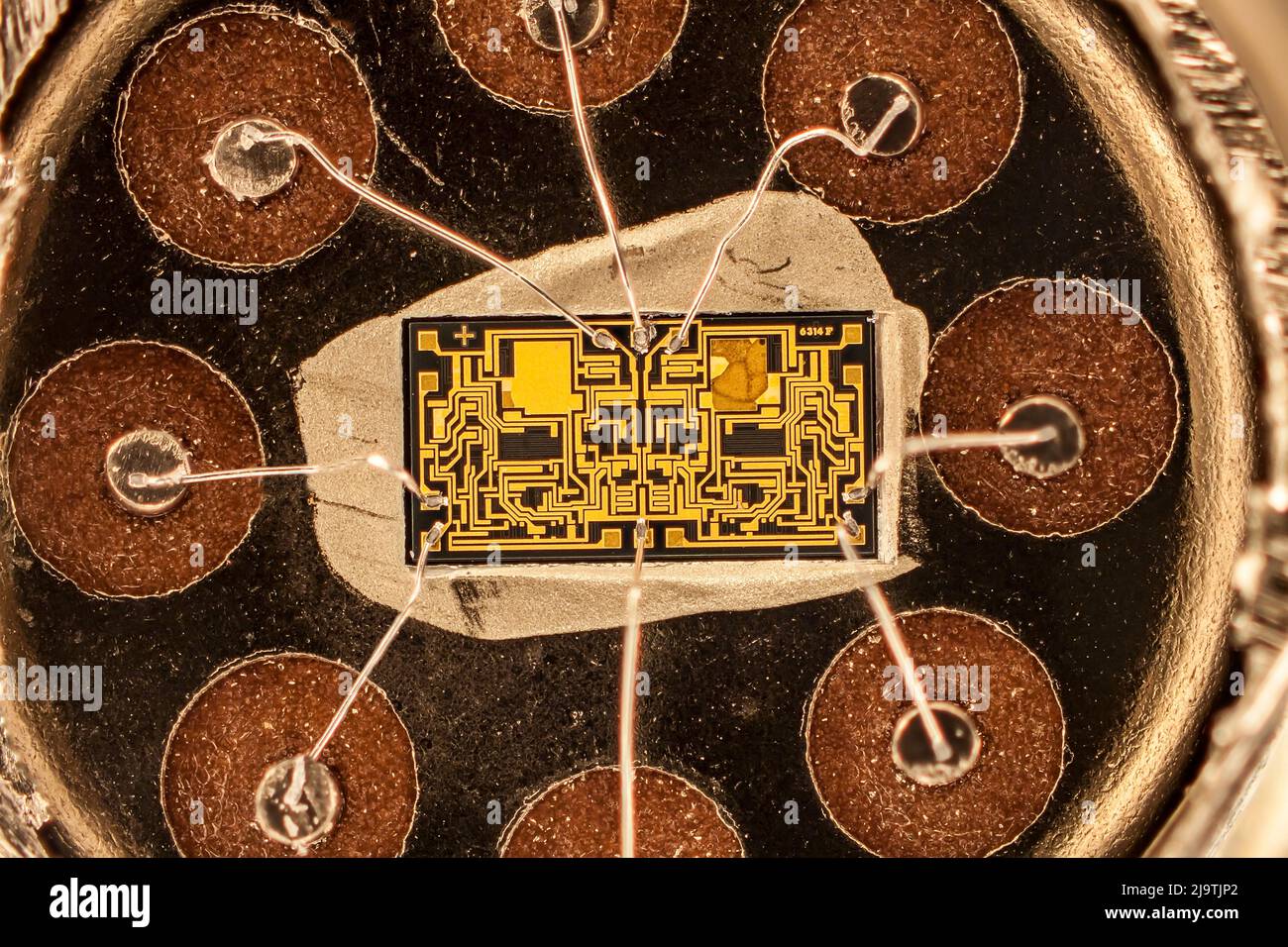 Housing with integrated circuit, light micrograph Stock Photo - Alamy