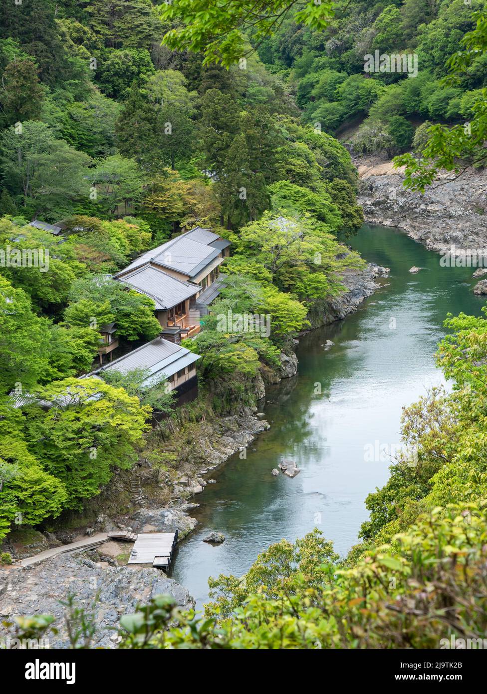Traditional japanese style wooden houses in the mountains with river ...