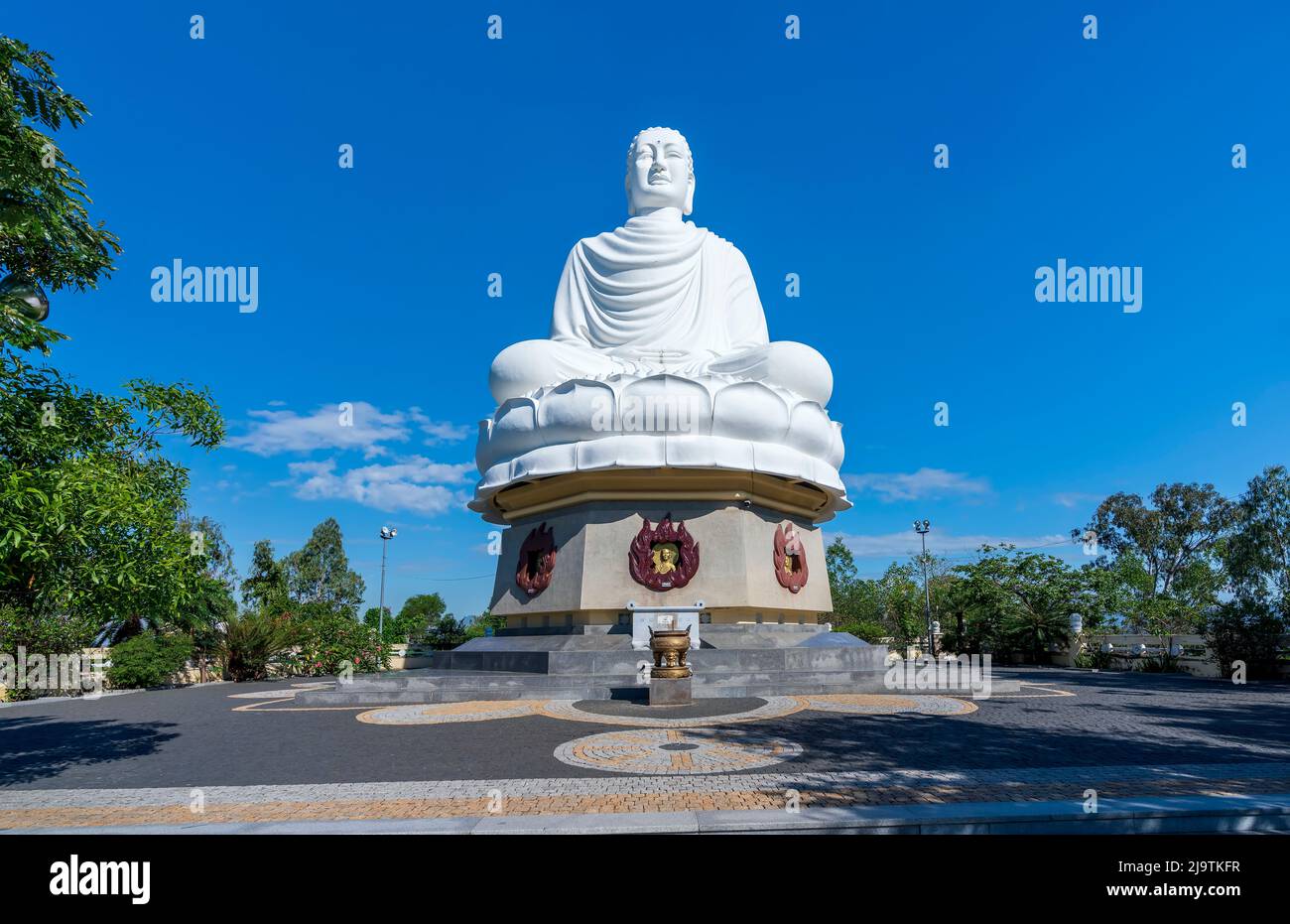 Buddha statue at Long Son pagoda in summer morning, ancient temple of ...