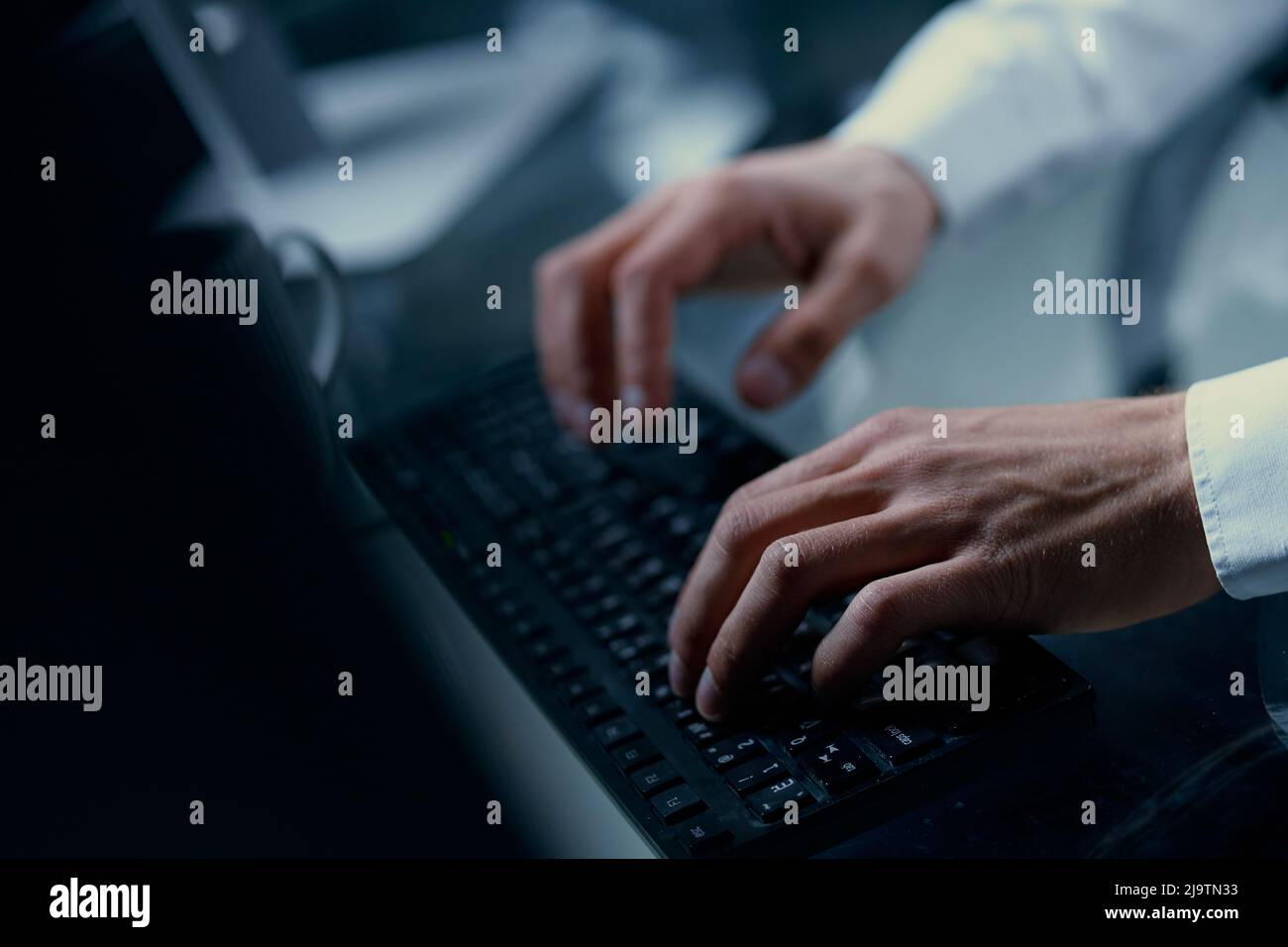 person typing text on a computer keyboard Stock Photo - Alamy